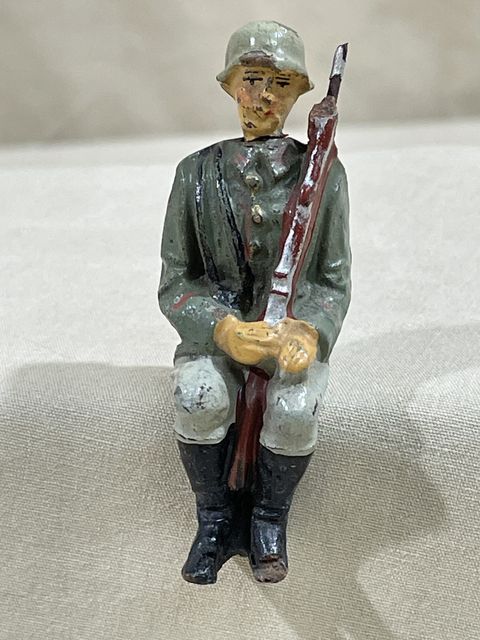 Bunker Militaria: Original Nazi Era German Toy Soldier Sitting with Rifle